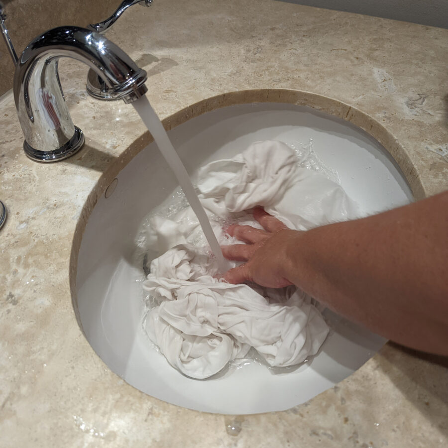 Travel Laundry: How to Hand Wash Clothes in a Sink | WanderBIG.com