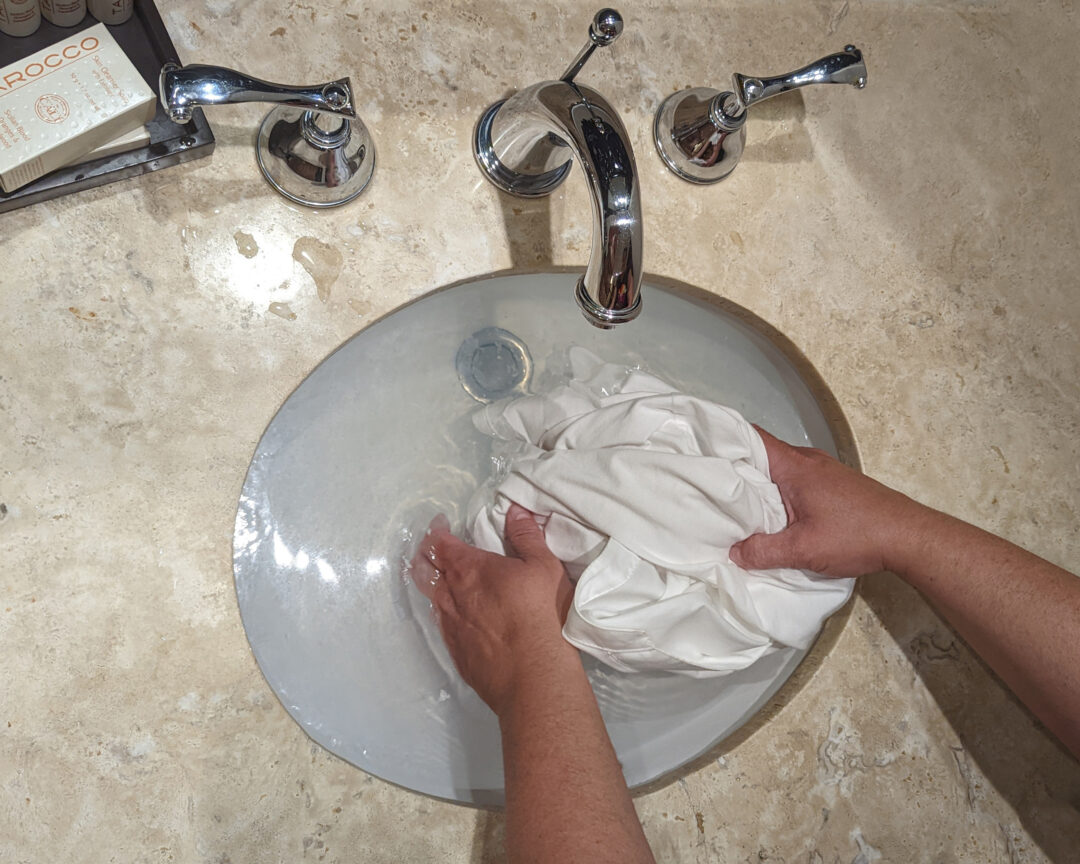 Travel Laundry: How to Hand Wash Clothes in a Sink | WanderBIG.com